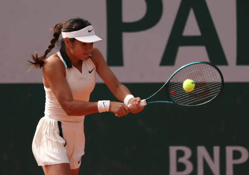 French Open: Emma Raducanu survives tough opener to set up Iga Swiatek ...